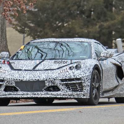 ...车型应该有的空气动力学套件,结合右前侧和左后侧都配备有用来切断...