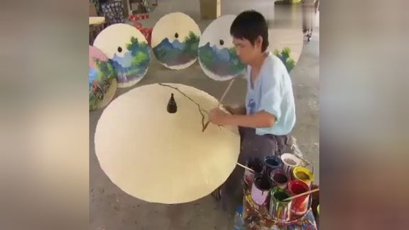 油纸伞的制作工艺概览,看着它不禁想起:戴望舒的雨巷
