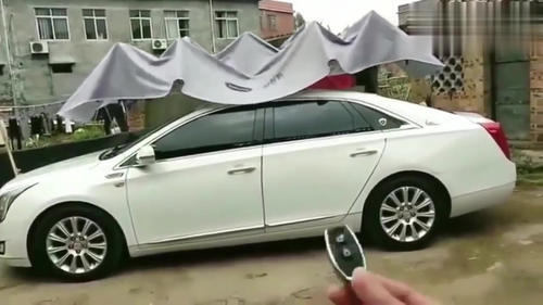 广西农村小伙的汽车遮阳伞,一键启动,这波操作我服了!