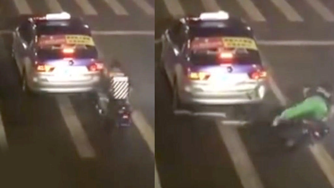 少年骑电动径直追尾出租 一直低头看手机惹祸