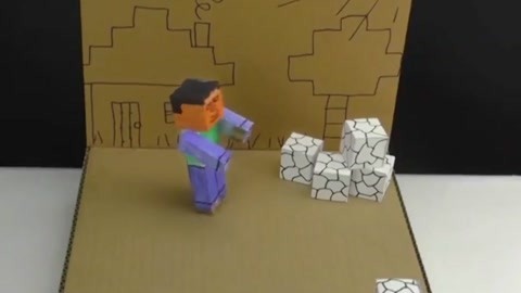 小伙用纸板制作《我的世界》游戏,可以帮史蒂夫推箱子,创意十足