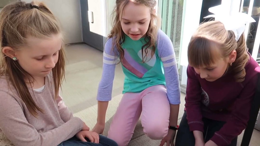 Friends Solve Clues in the Toy
