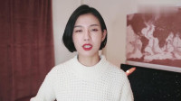 军绿色保暖羽绒大衣,毛绒帽子,蓬松、保暖
