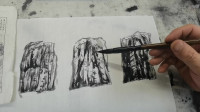 国画用笔,用墨不同,可以画出不同的三种山石形态