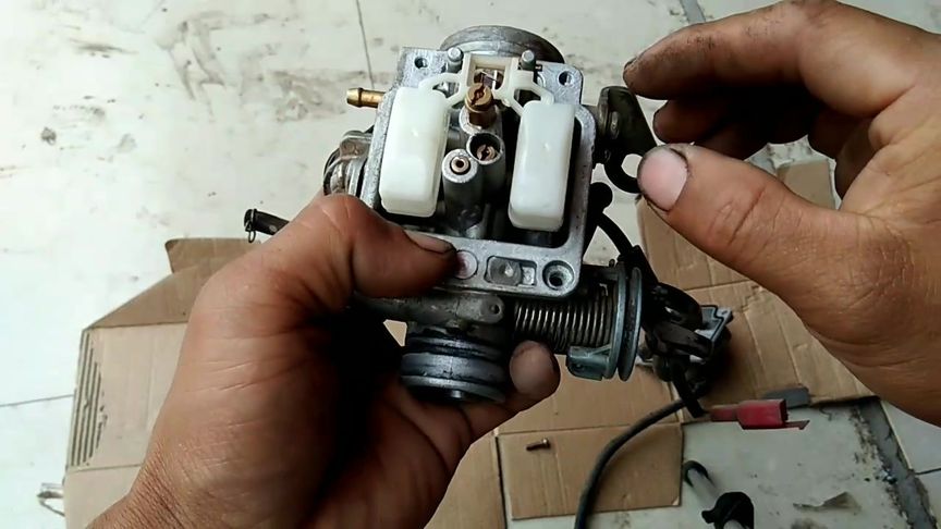 踏板摩托车化油器怎么清洗及化油器油平面怎么调?