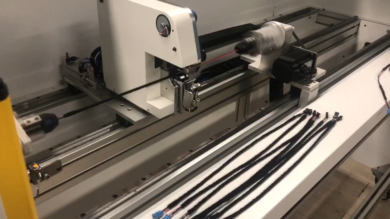 定制连缠胶布机汽车线束包胶布机器连续缠绕机