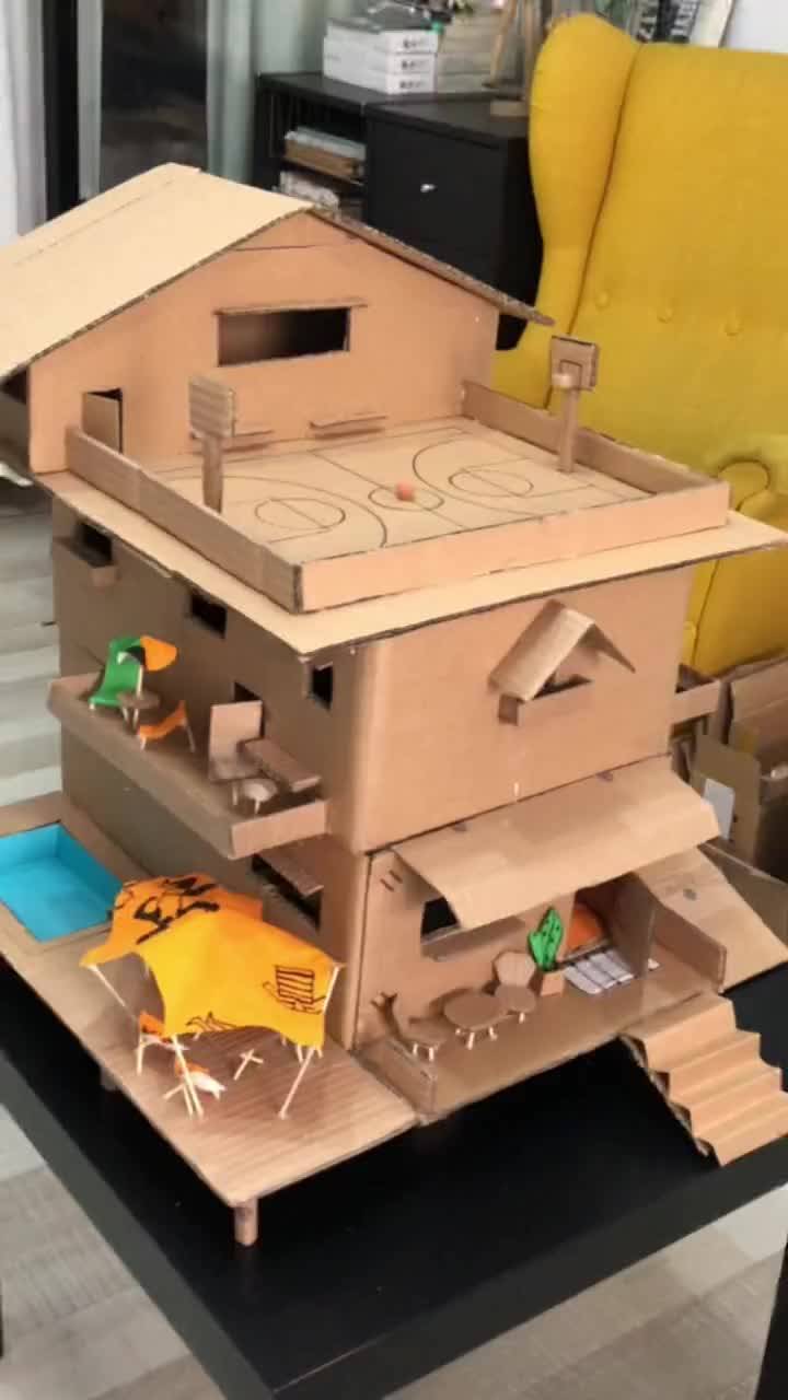 和孩子一起手工diy废纸箱制作小房子