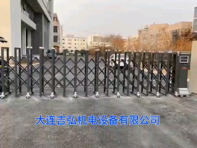 铝合金电动伸缩门安装完成,大连保税区工厂大门项目,大连吉弘机电...