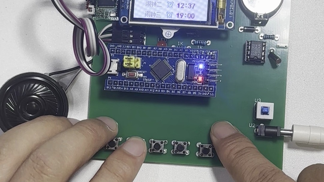 基于stm32单片机智能万年历数字电子时钟闹钟语音播报设计系统diy ...