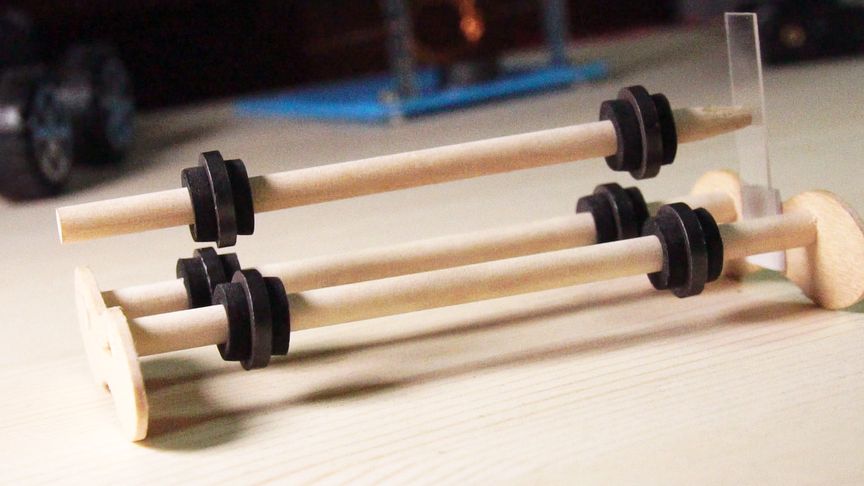 用几根木棒和磁铁制作一个磁悬浮模型,简单介绍其中原理