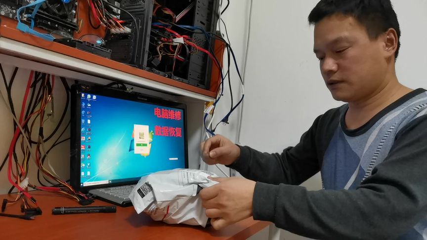 移动硬盘进水主板坏磁头坏还真不好稿呀数据恢复