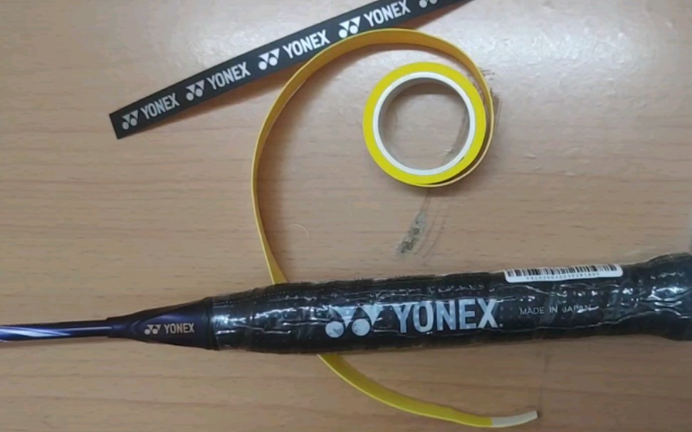 非常简单的羽毛球拍的手胶缠法
