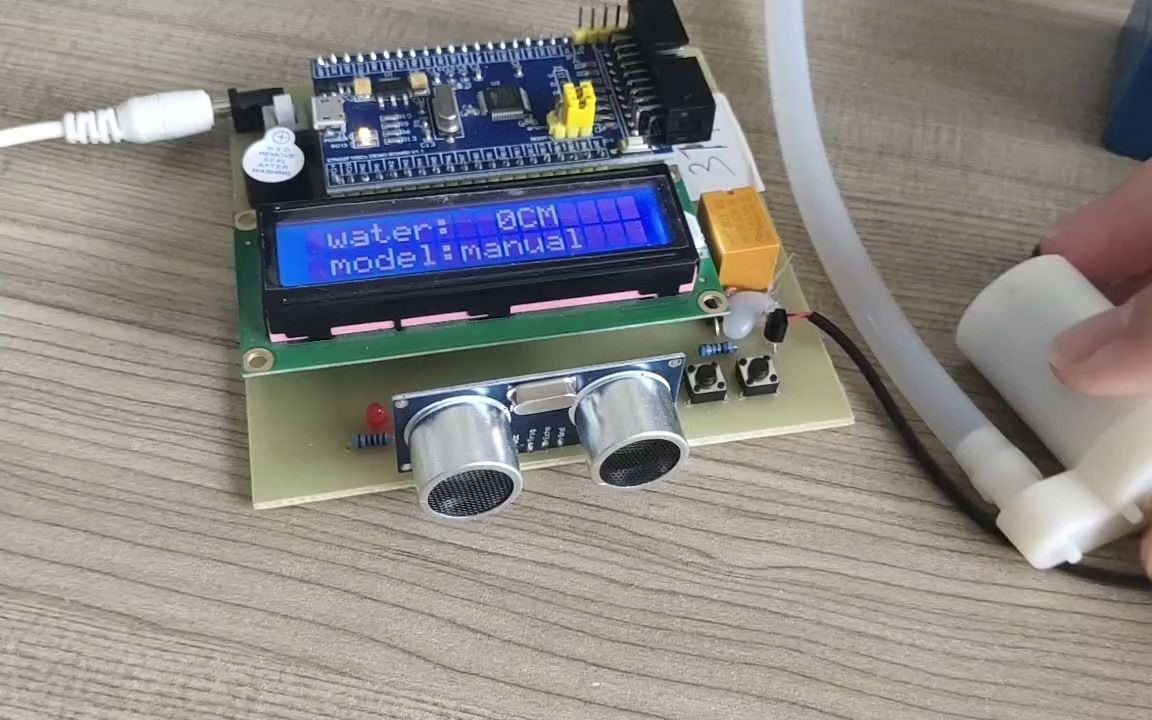 371 STM32 超声波测量水位 STM32单片机水位检测控制系统水塔液位...