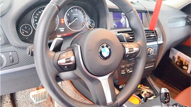 宝马X3方向盘328M换挡拨片、定速巡航多功能方向盘