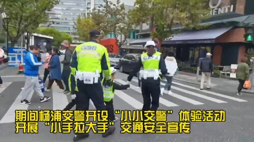 "平安市集"--"小手拉大手"交通安全宣传活动