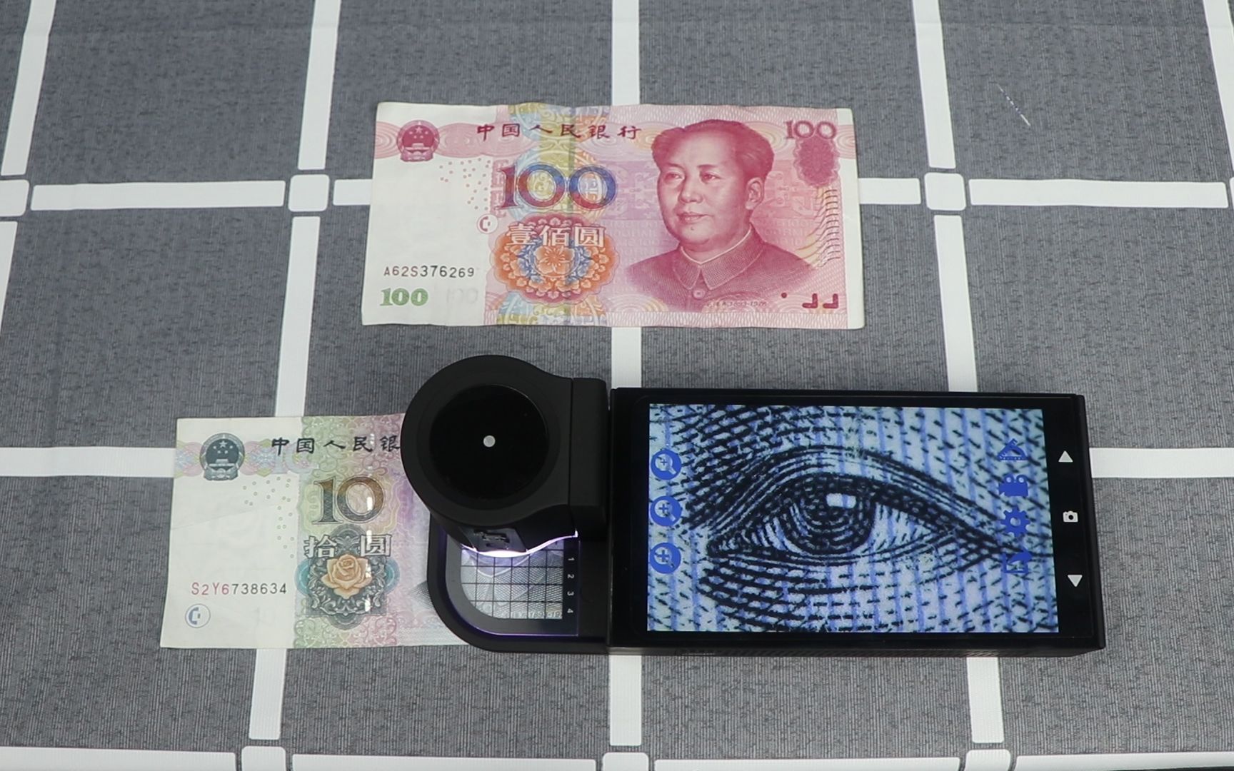 5000块电子显微镜放大人民币上的金线,我发现神秘防伪图案