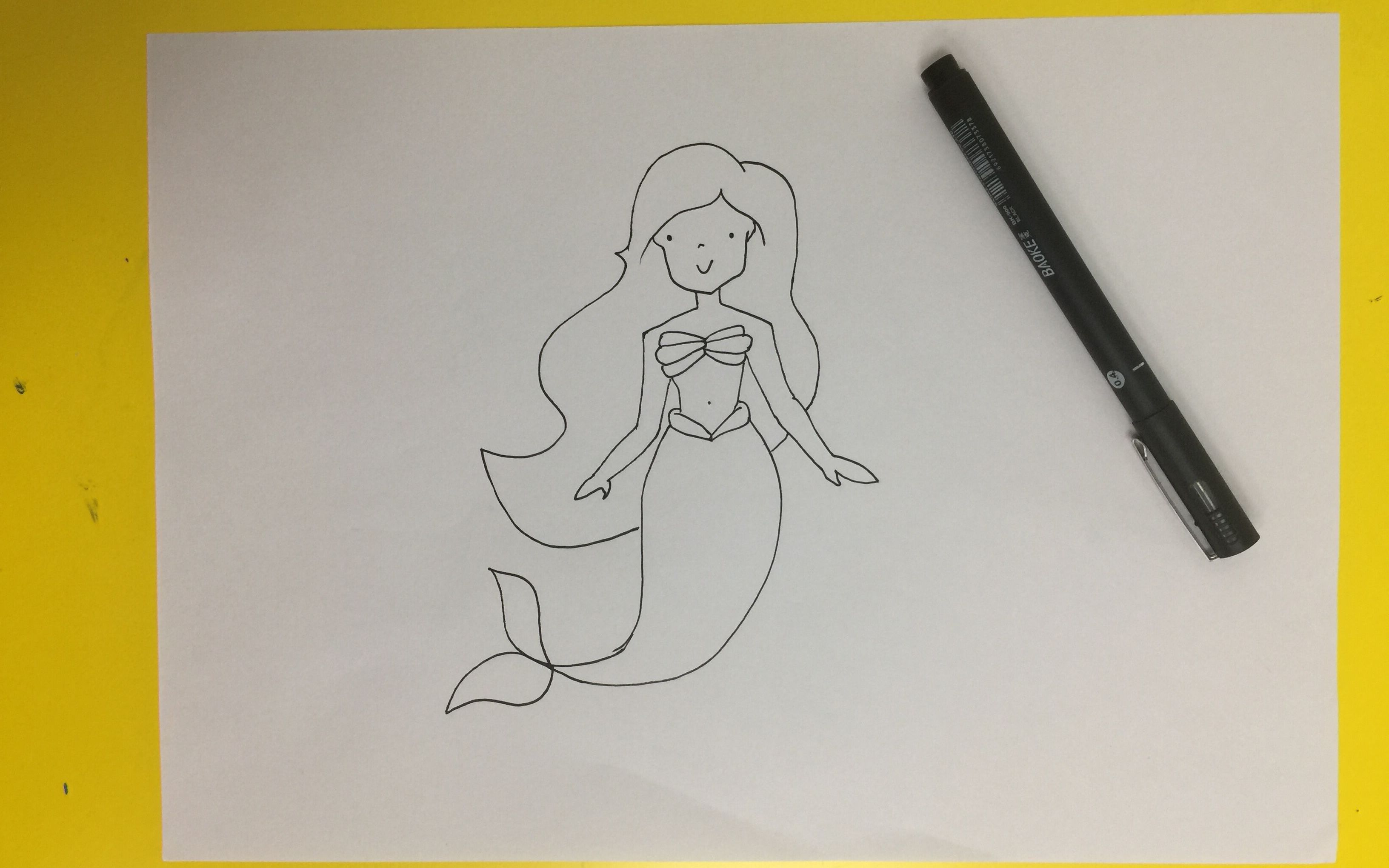 童话话故事里美丽的人鱼公主简笔画画法
