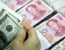 为什么6.8元人民币才能兑换1美元,是怎么计算出来的?
