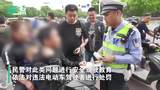 北京严查电动车违法带人 一小时罚了15起