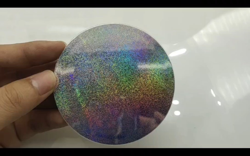 模内注塑IML工艺塑胶外壳产品,其表面产品效果为镭射闪银效果,材质...