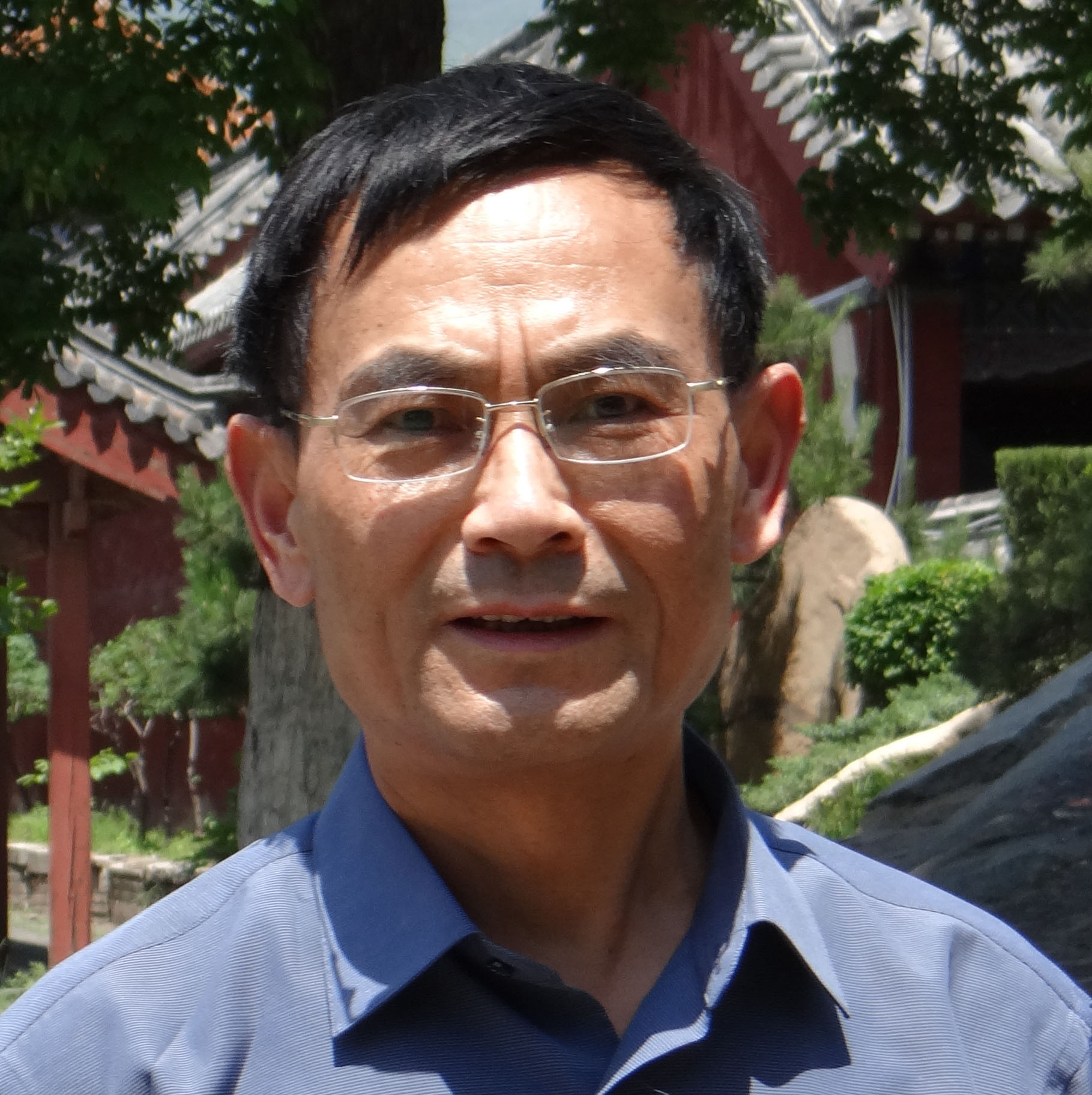 王照伦 