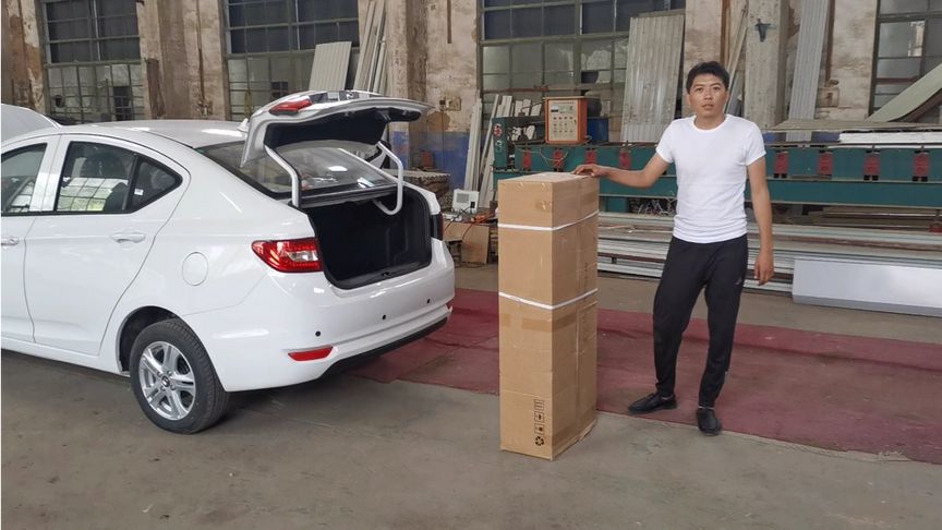 这么大的物品都可以放入电动车的后备箱?