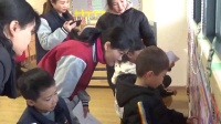 桂林国奥城主题墙讲解与幼儿自评与互评