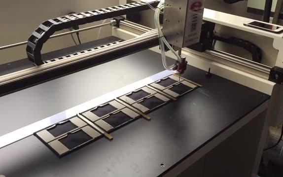 深圳三旗 自动喷胶机 自动涂胶机 包装行业设备