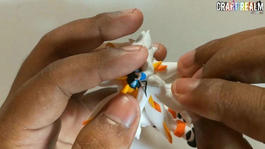 用橡皮泥捏一个精灵宝可梦的手办,你能说出它的名字吗?