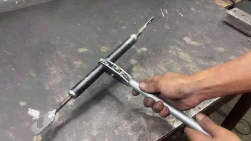 真是创意无限,弹簧配合齿轮,制作出紧线器