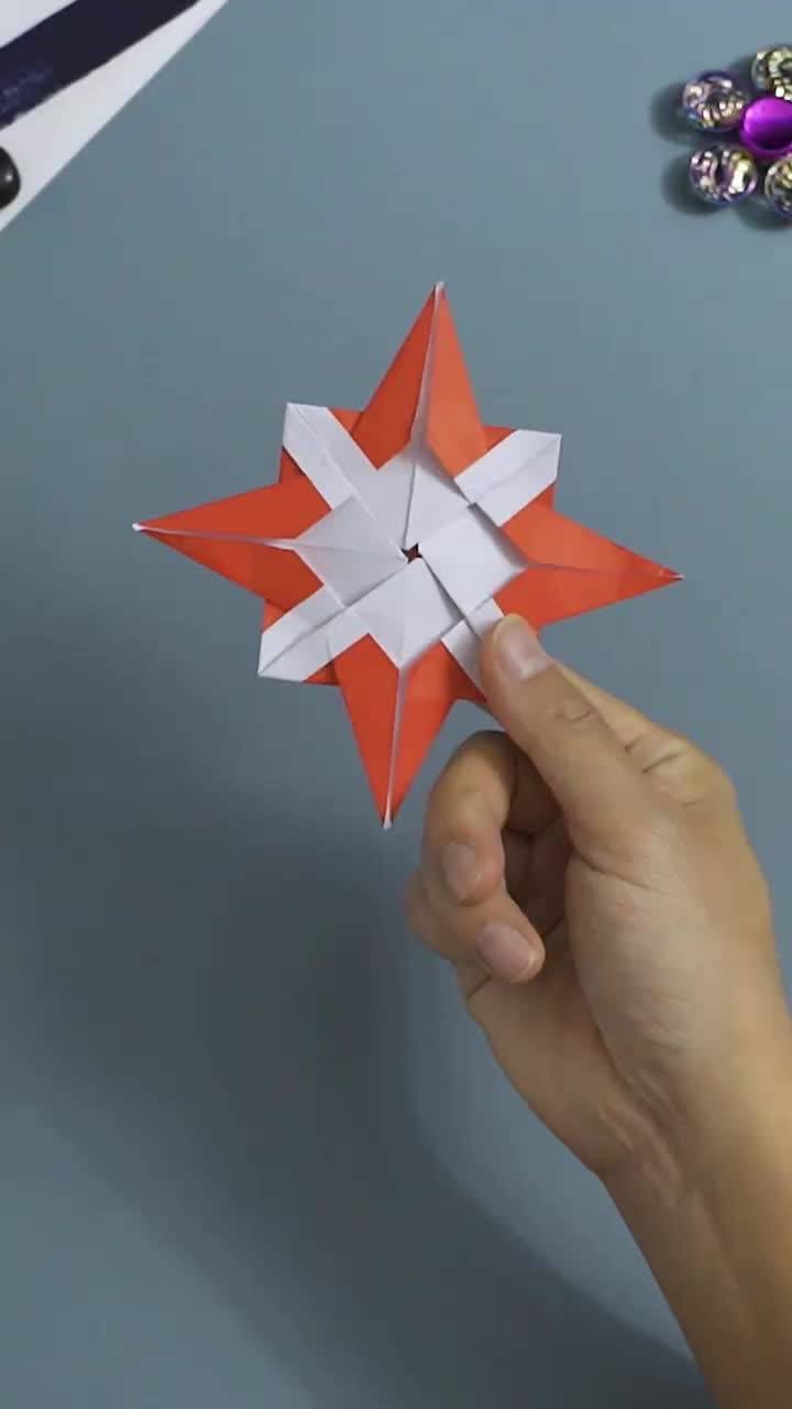 一张纸就能折的八角回旋镖。