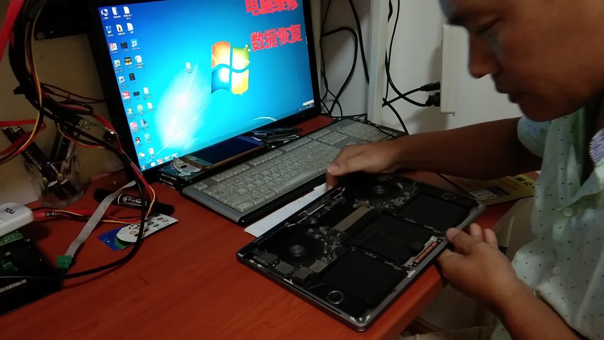 .一台苹果笔记本自己进水后自己清结果进不了系统找不到硬盘