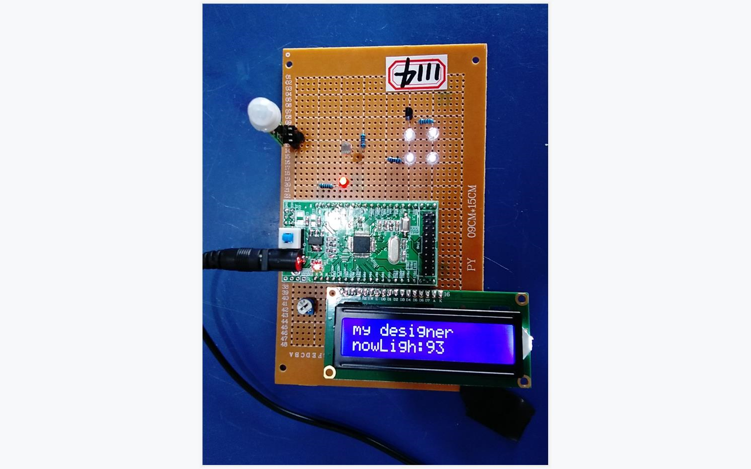 基于STM32单片机的智能台灯设计-LCD1602-热释-光敏-高亮DIY开发...
