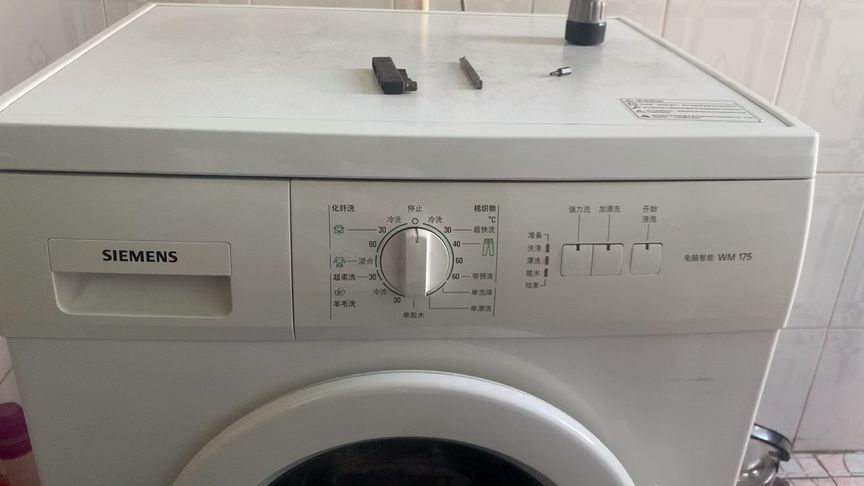 西门子滚桶洗衣机wM175\XQG5.2公斤不通电丶不启动主板维修