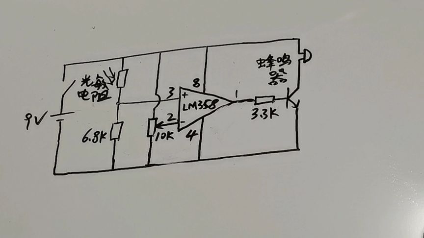 天一亮蜂呜器就响电路原理是比较器和光敏电阻作用