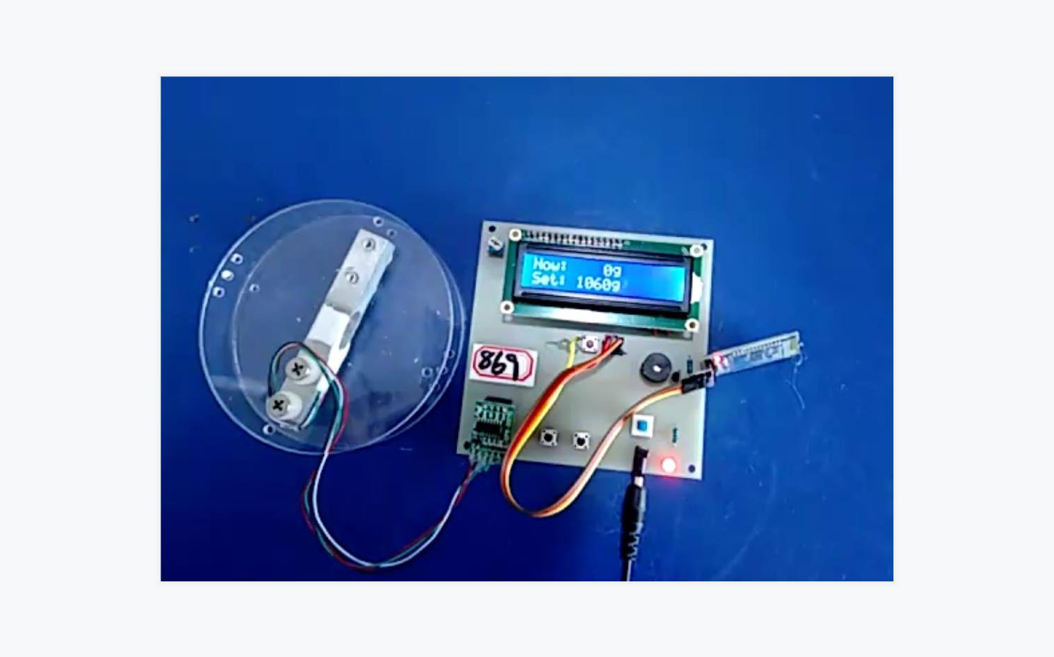 基于51单片机的电子秤称重压力检测阈值报警仪系统设计蓝牙手机APP...