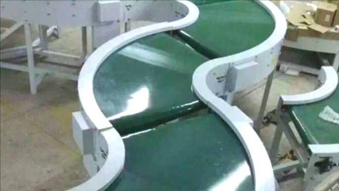 皮带输送机是如何实现转弯的?它是如何设计的?