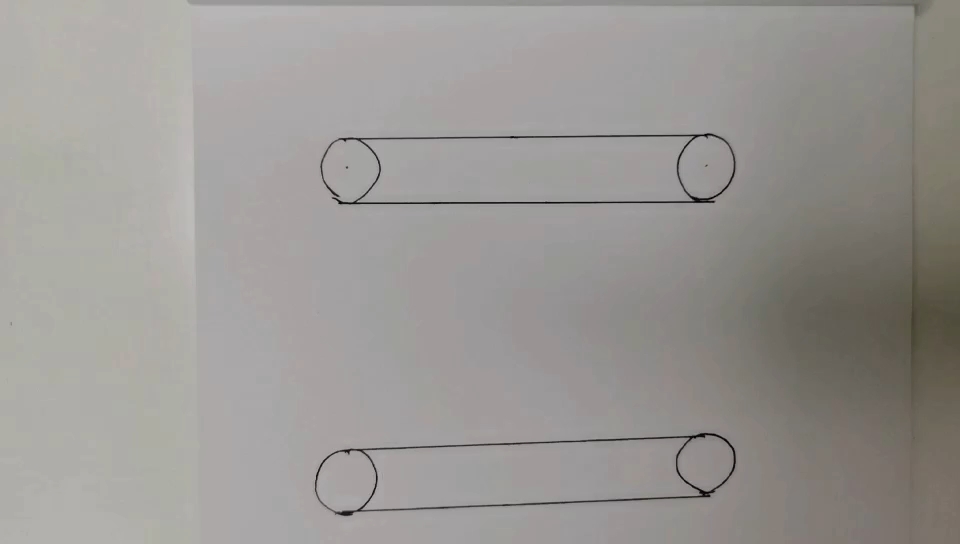 高中物理中煤块在传送带上的划痕成因
