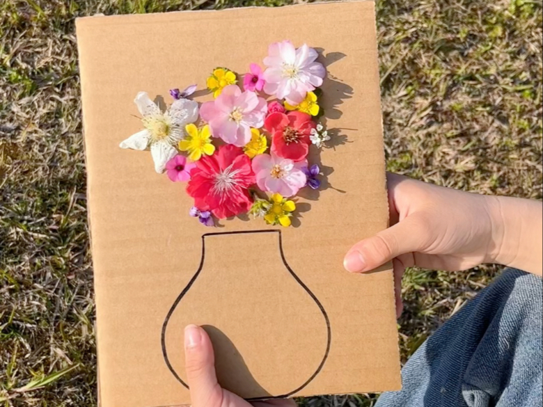 在纸箱上画一个花瓶,带孩子去户外寻找春天吧