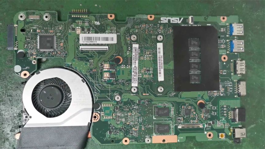 ASUS笔记本主板不充电,拆出主板一看,充电接口有电容烧糊了