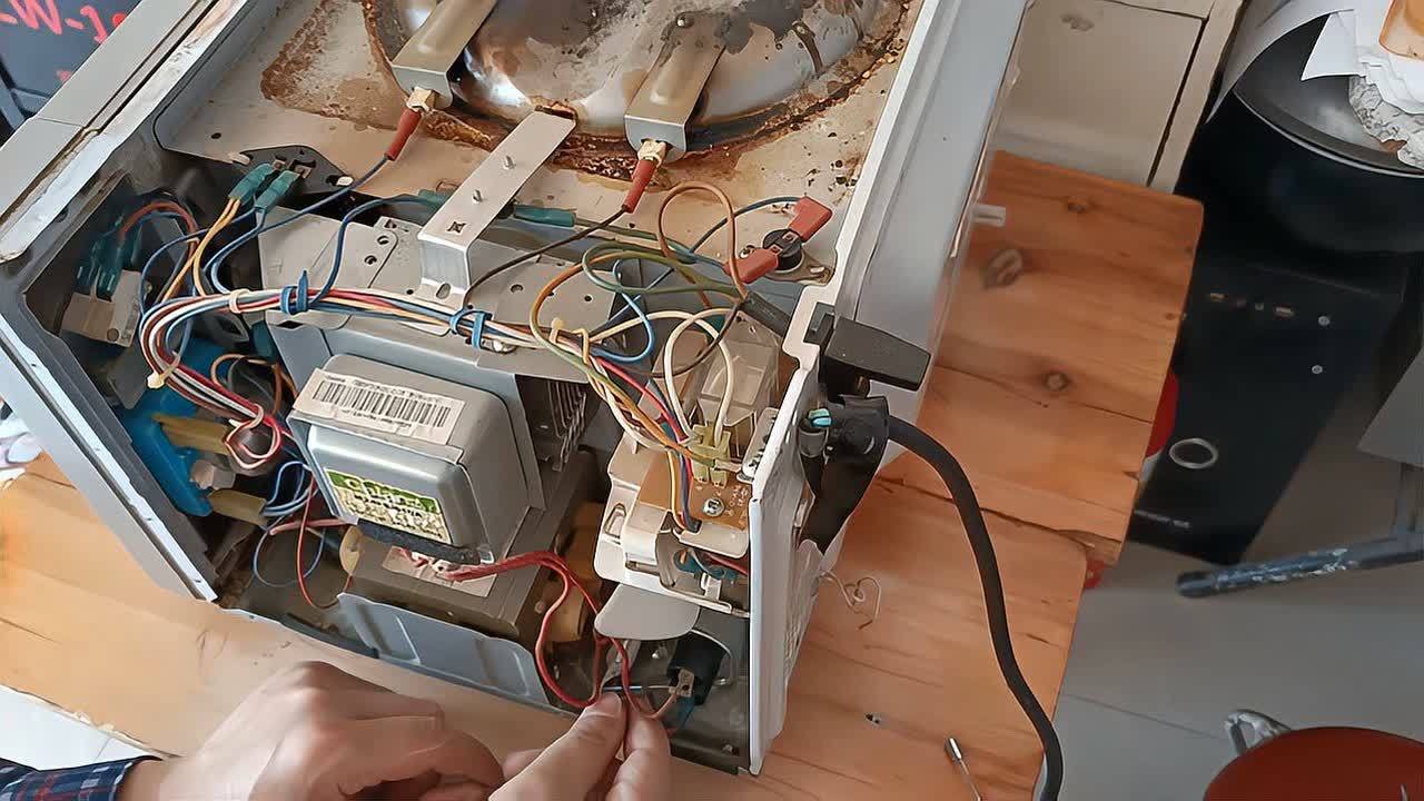 格兰仕微波炉有电源指示按键正常,不加热故障维修