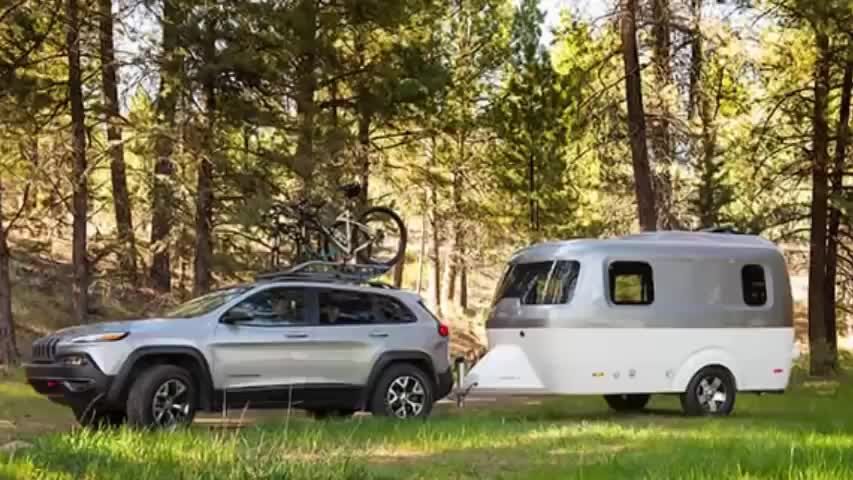 这种小型的拖挂式房车,国内不会受限高影响,足够一家三口使用了