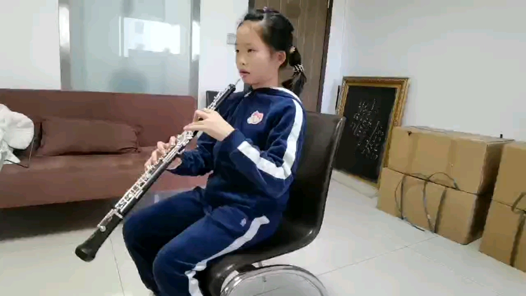 双簧管之声俱乐部新会员三年级的温欣在俱乐部学习不到一个月进步...