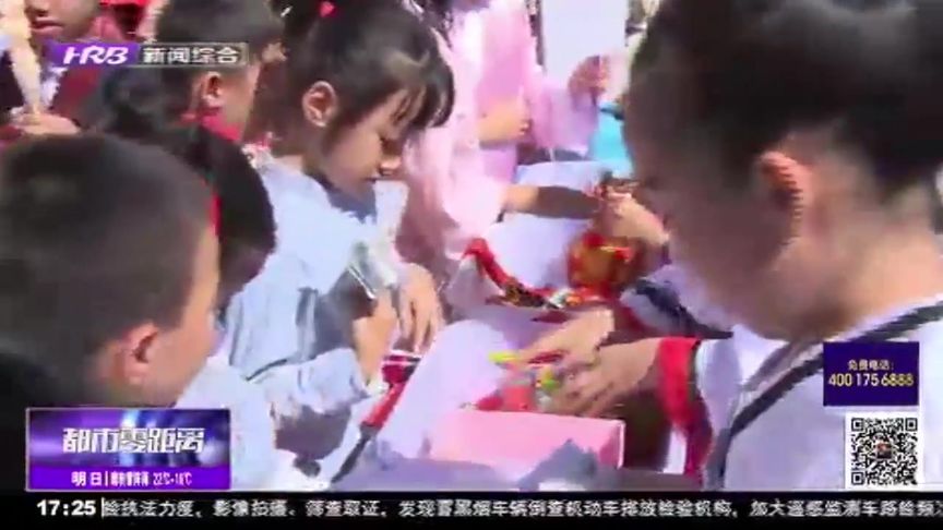 弘扬中华优秀传统文化,阳明小学义卖献爱心,孩子自制端午小手工