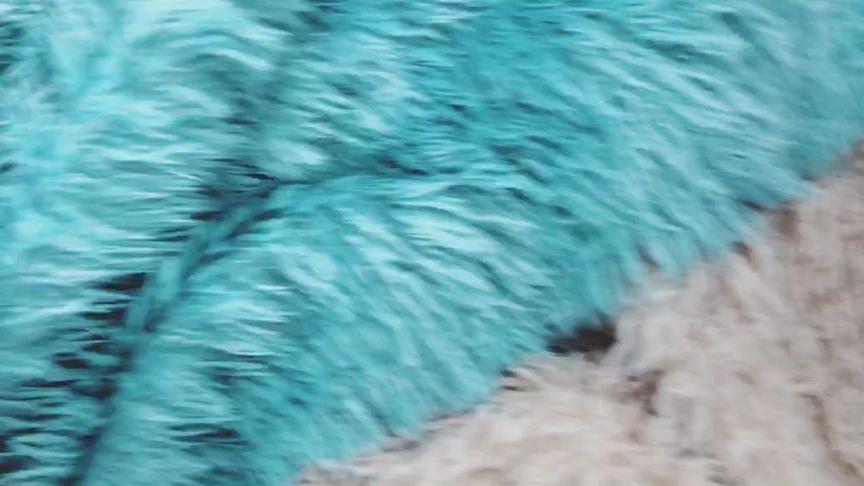 大牌面料艾丽丝仿皮草面料,保暖舒适。颜色大气