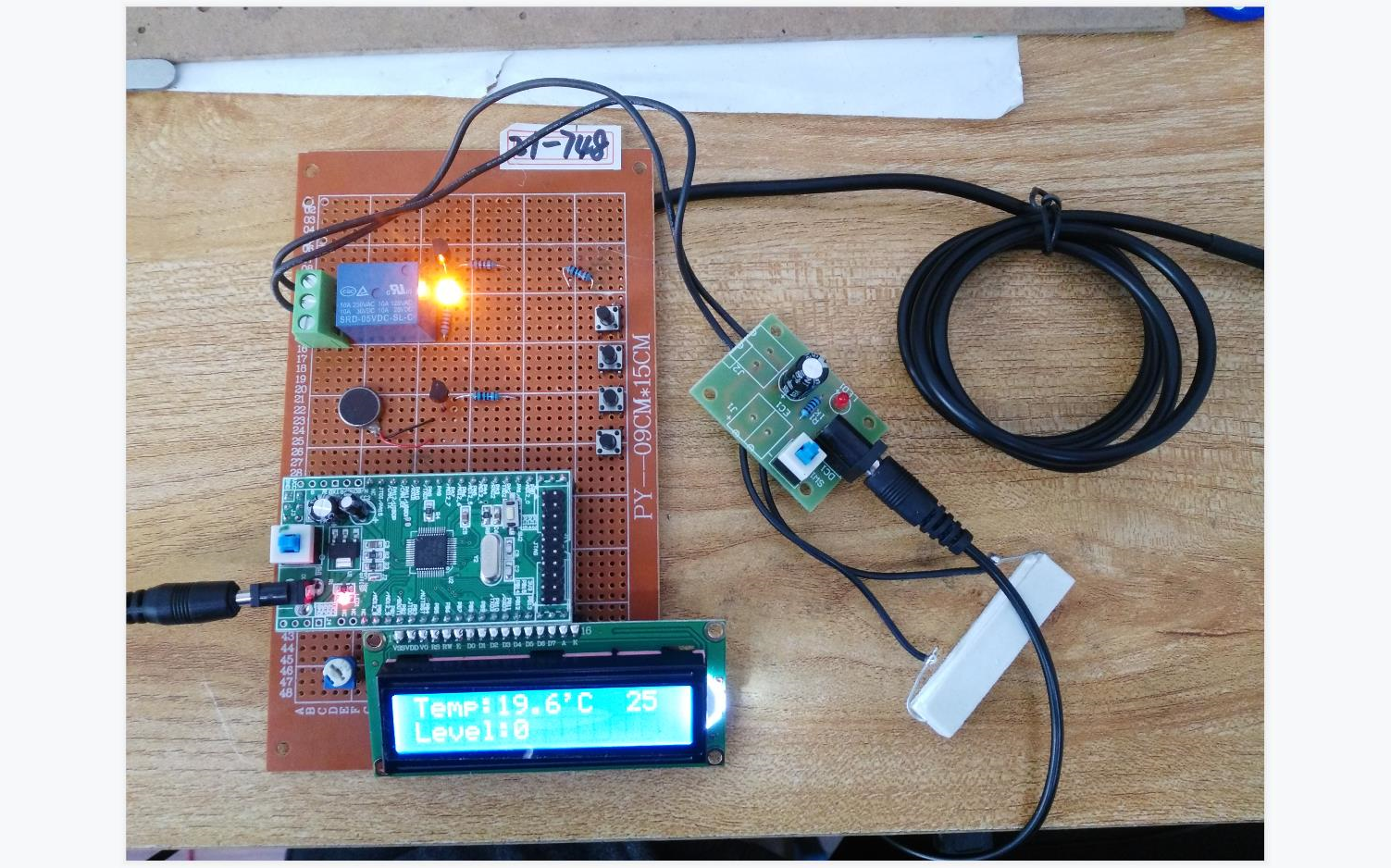 基于STM32单片机的震动按摩仪控制系统设计-LCD1602-DS18B20-...