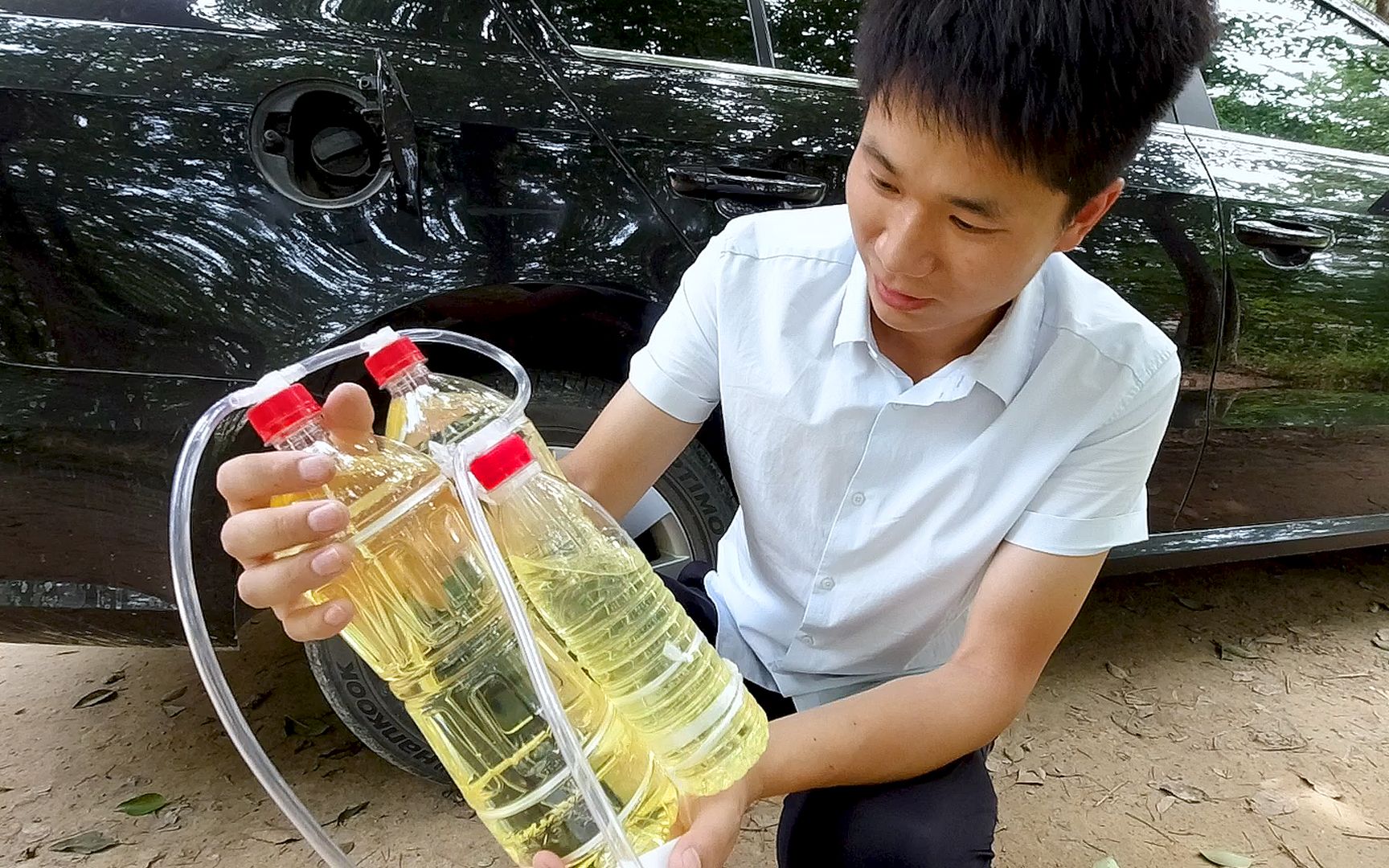 矿泉水瓶和钓鱼氧气泵制作抽汽车汽油的抽油泵,以后再也不用担心...