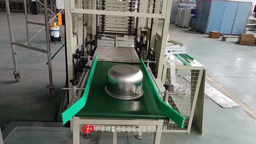 两台Z型连续式升降机,顶部用一条6米长流水线连接过渡