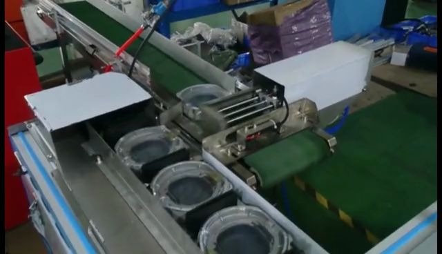 自动装盒机设备五金配件包装边封热收缩加自动装盒操作视频