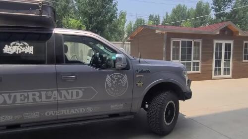 的皮卡背驮房车大家见么?